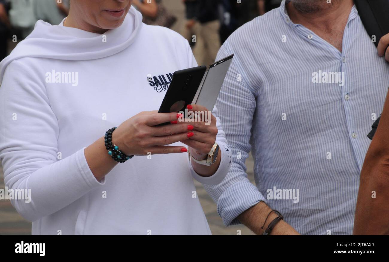 Copenhagen /Denmark/28 August 2022/ People use cellphones iphone or ...