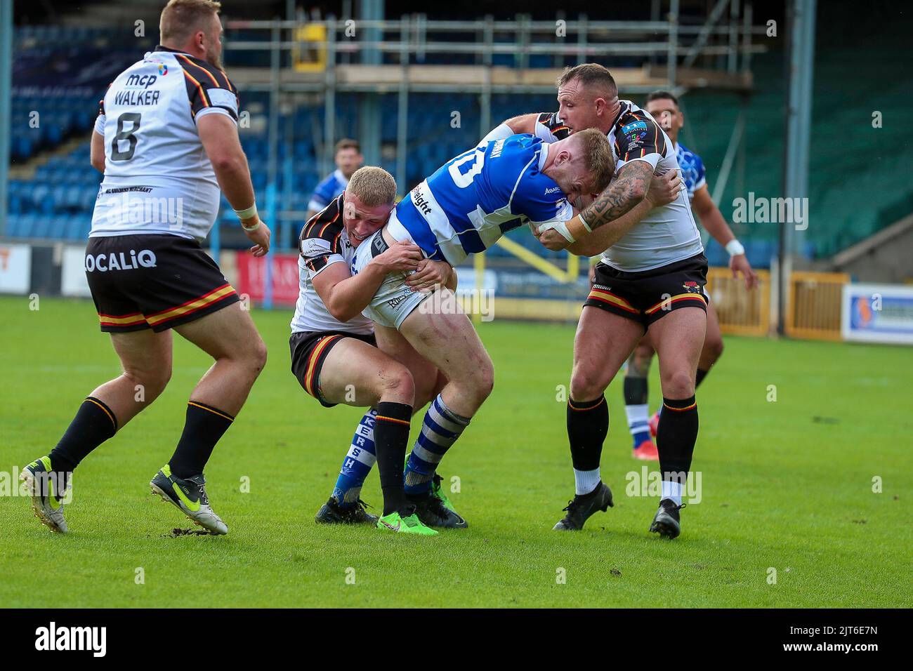 Halifax, UK. 28th Aug, 2022. *** George Flanagan tackles Dan Murray ...