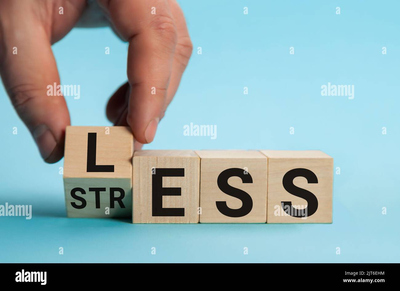 Having less stress or being stress-less. The word on wooden cubes. The ...