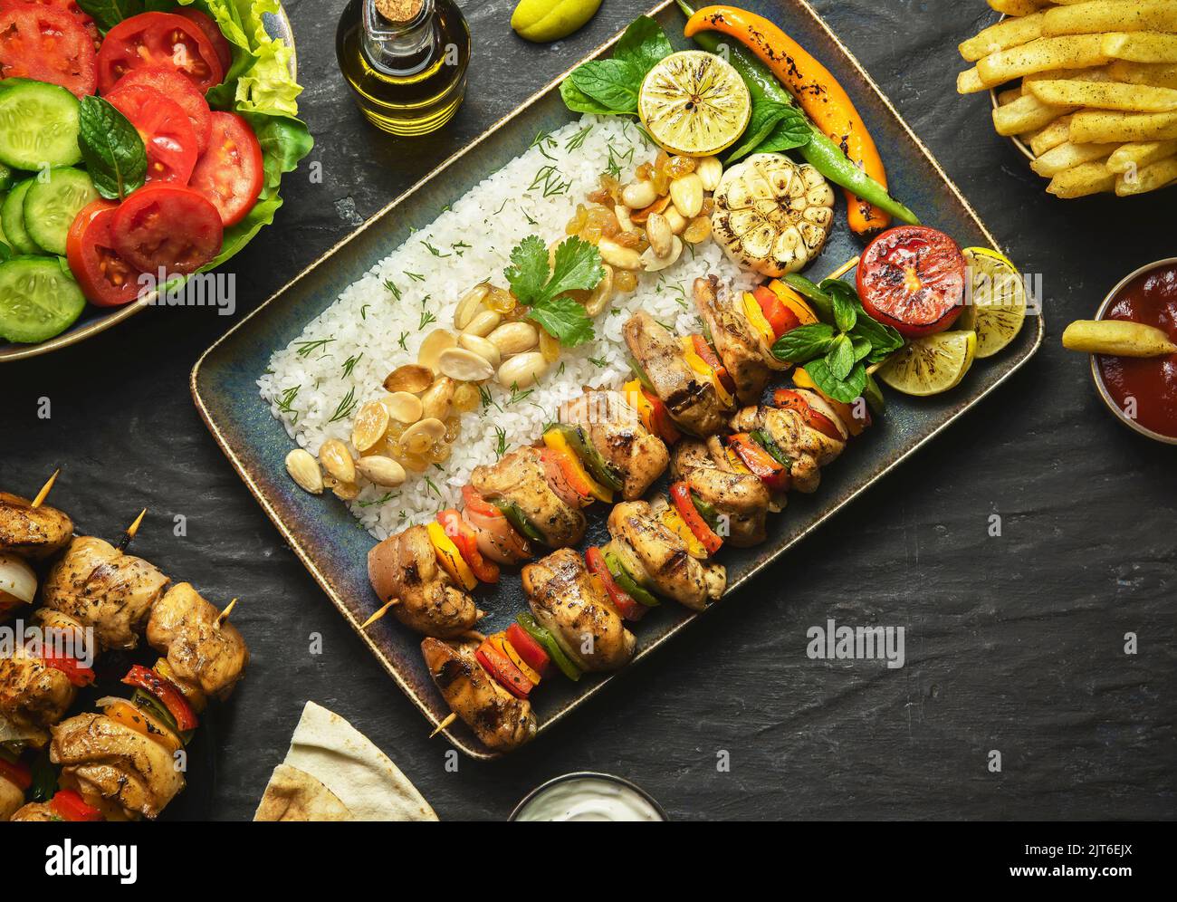 Arabic cuisine; Traditional Chicken Shish Kebabs or Shish Tawook ...