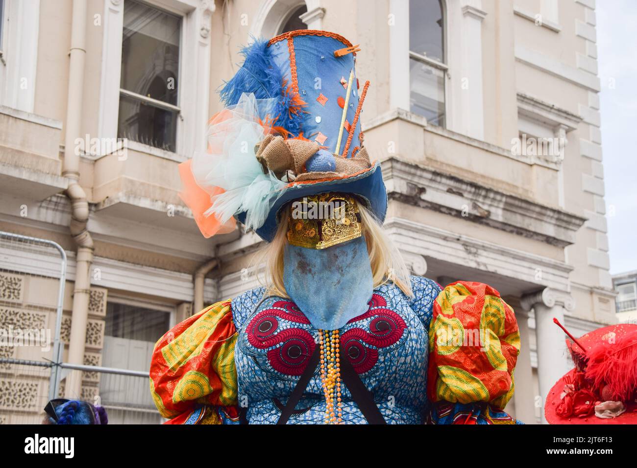 August 28, 2022, London, England, United Kingdom: A participant wears a ...