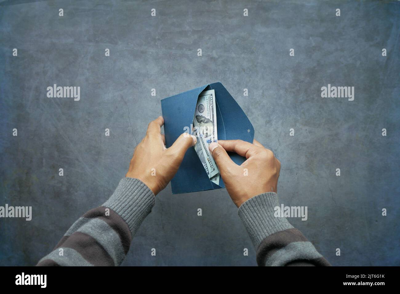 Salary envelope hi-res stock photography and images - Alamy