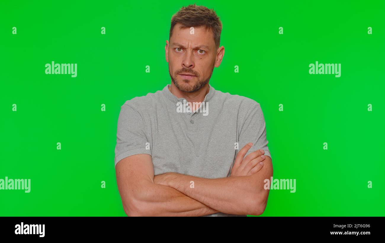 Dissatisfied handsome young man asking reason of failure, expressing ...