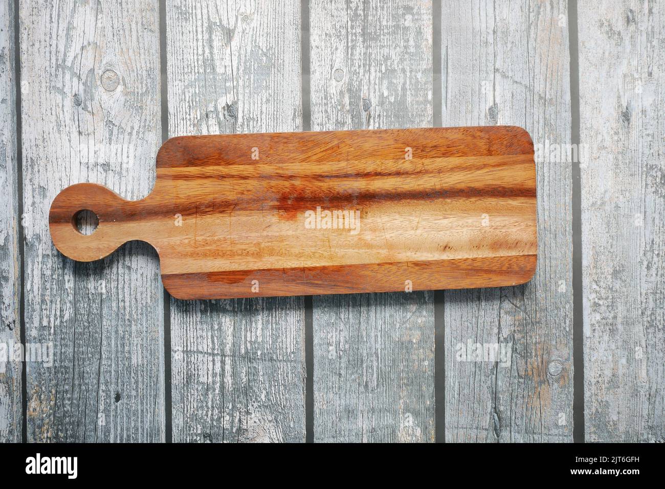 wooden chopping board on table top down Stock Photo - Alamy