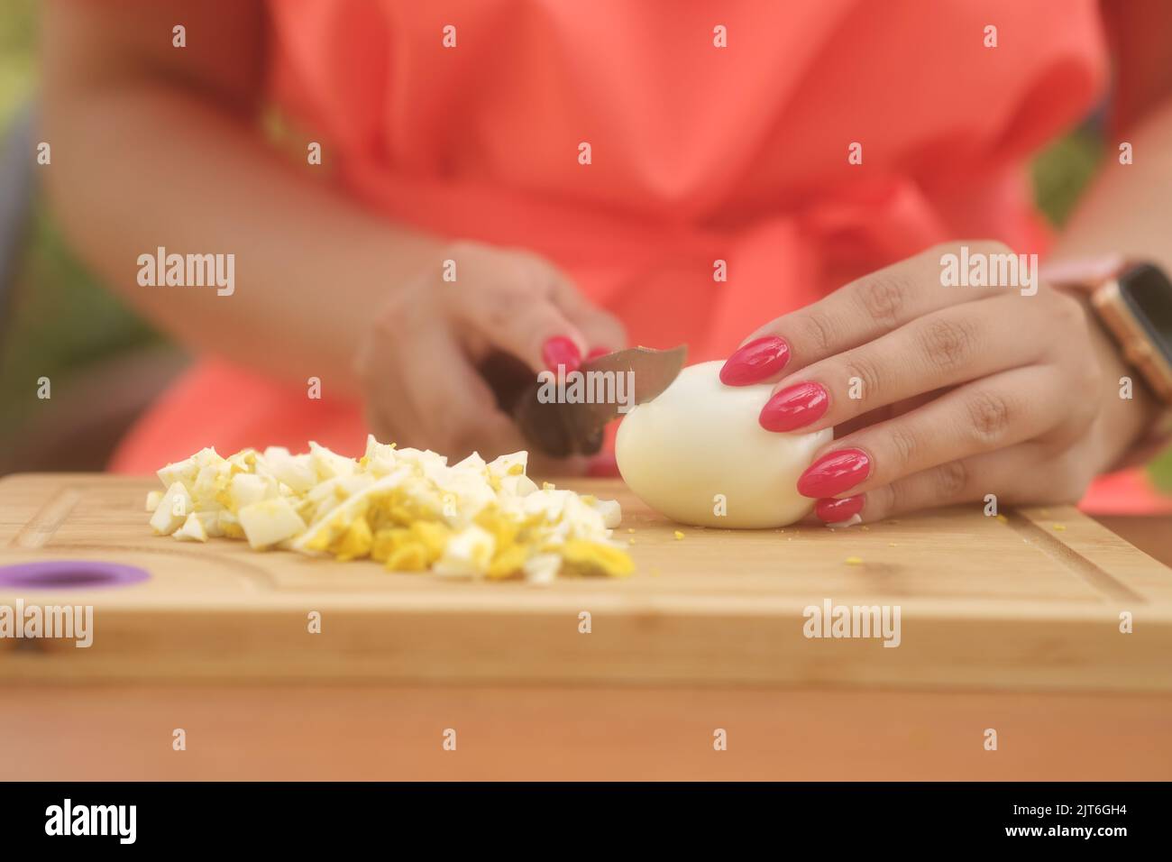 Cutting boiled egg on board hi-res stock photography and images - Alamy