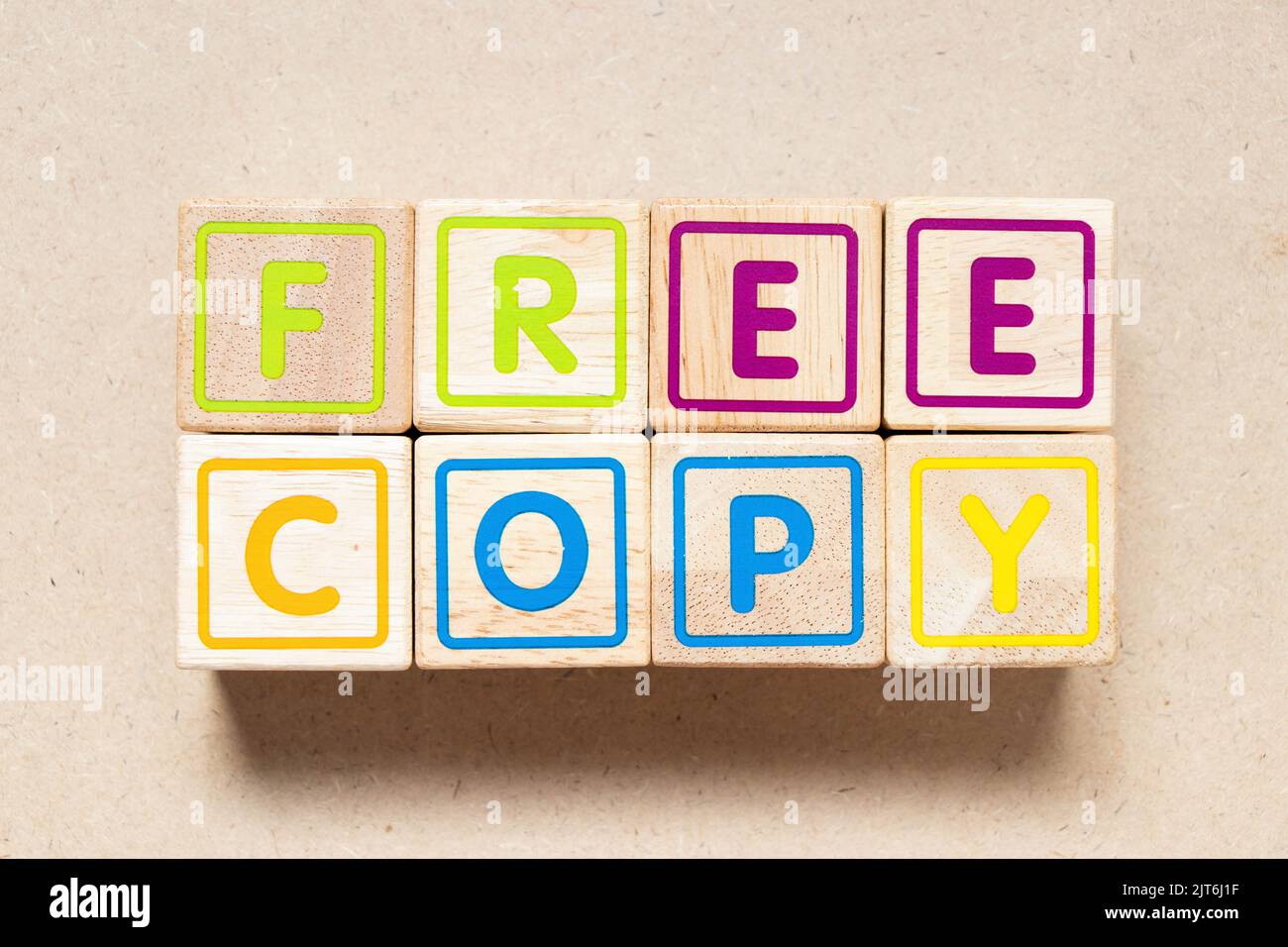 Color letter block in word free copy on wood background Stock Photo - Alamy