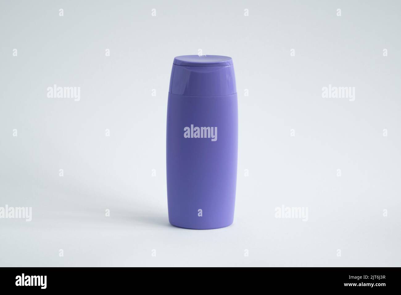 Violet blank plastic bottles isolated on white background Stock Photo ...