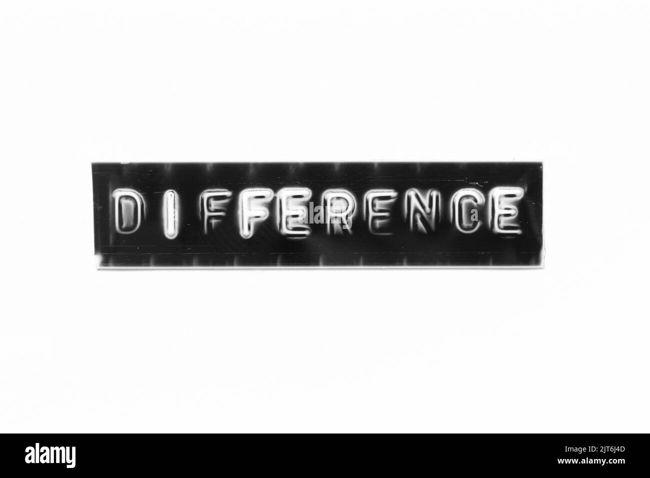 Embossed letter with word difference in black banner on white paper ...