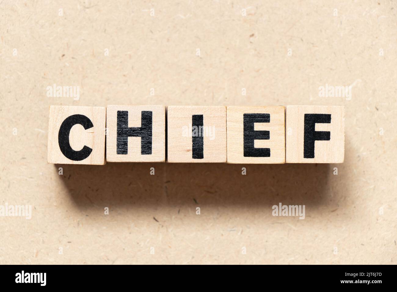 Alphabet letter block in word chief on wood background Stock Photo - Alamy