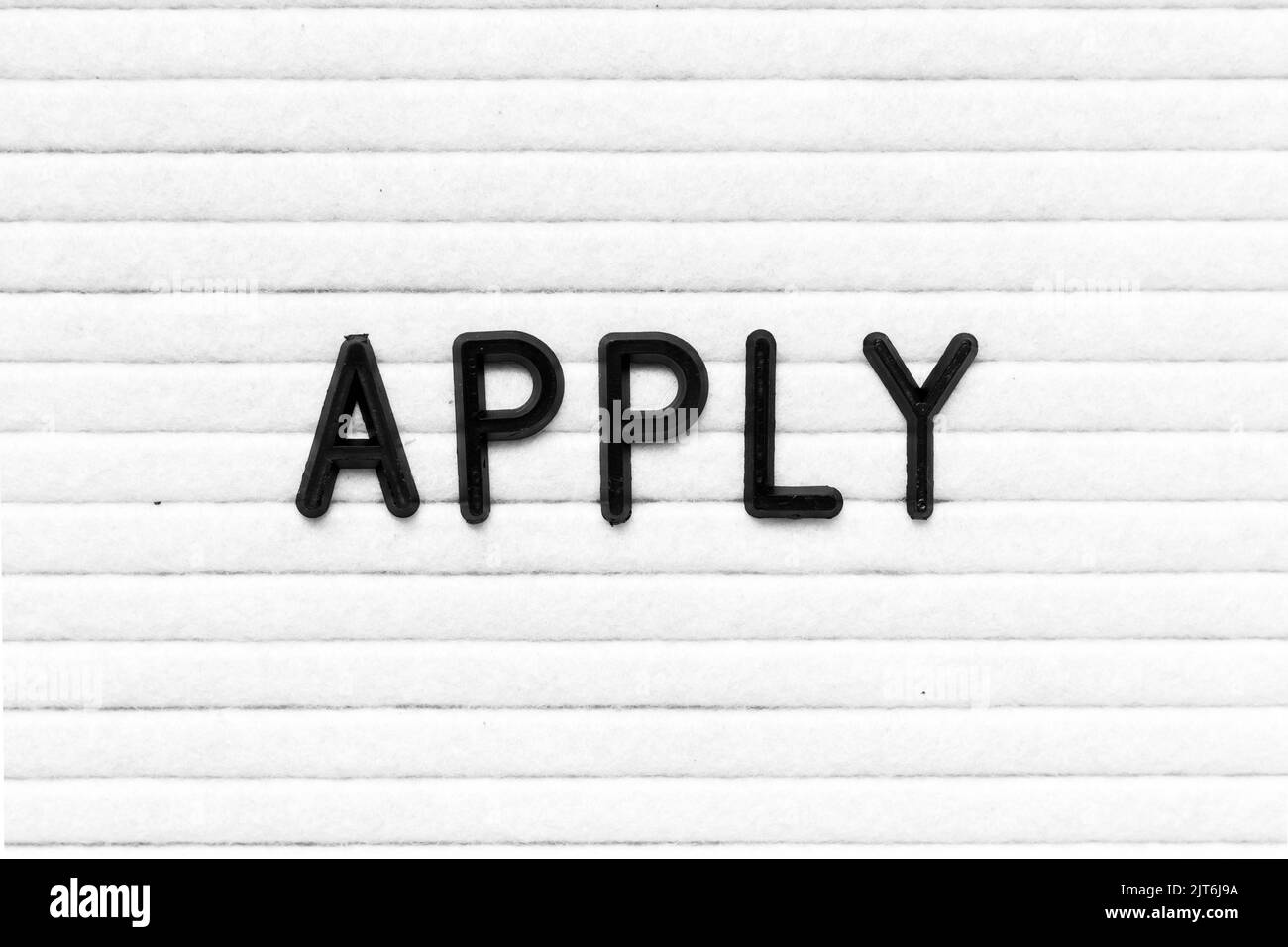 Black color letter in word apply on white felt board background Stock ...