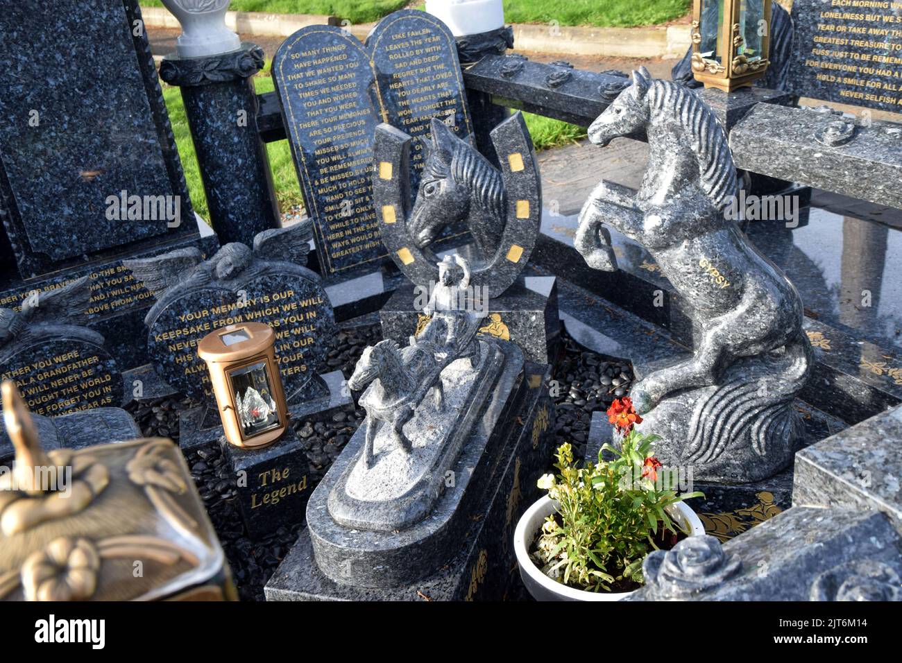 marble statues on grave, thurles, tipperary, ireland Stock Photo - Alamy
