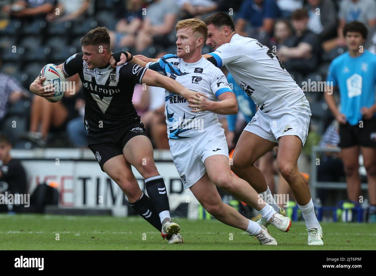 Cameron Scott #24 of Hull FC is stopped by the Toulouse defence Stock ...