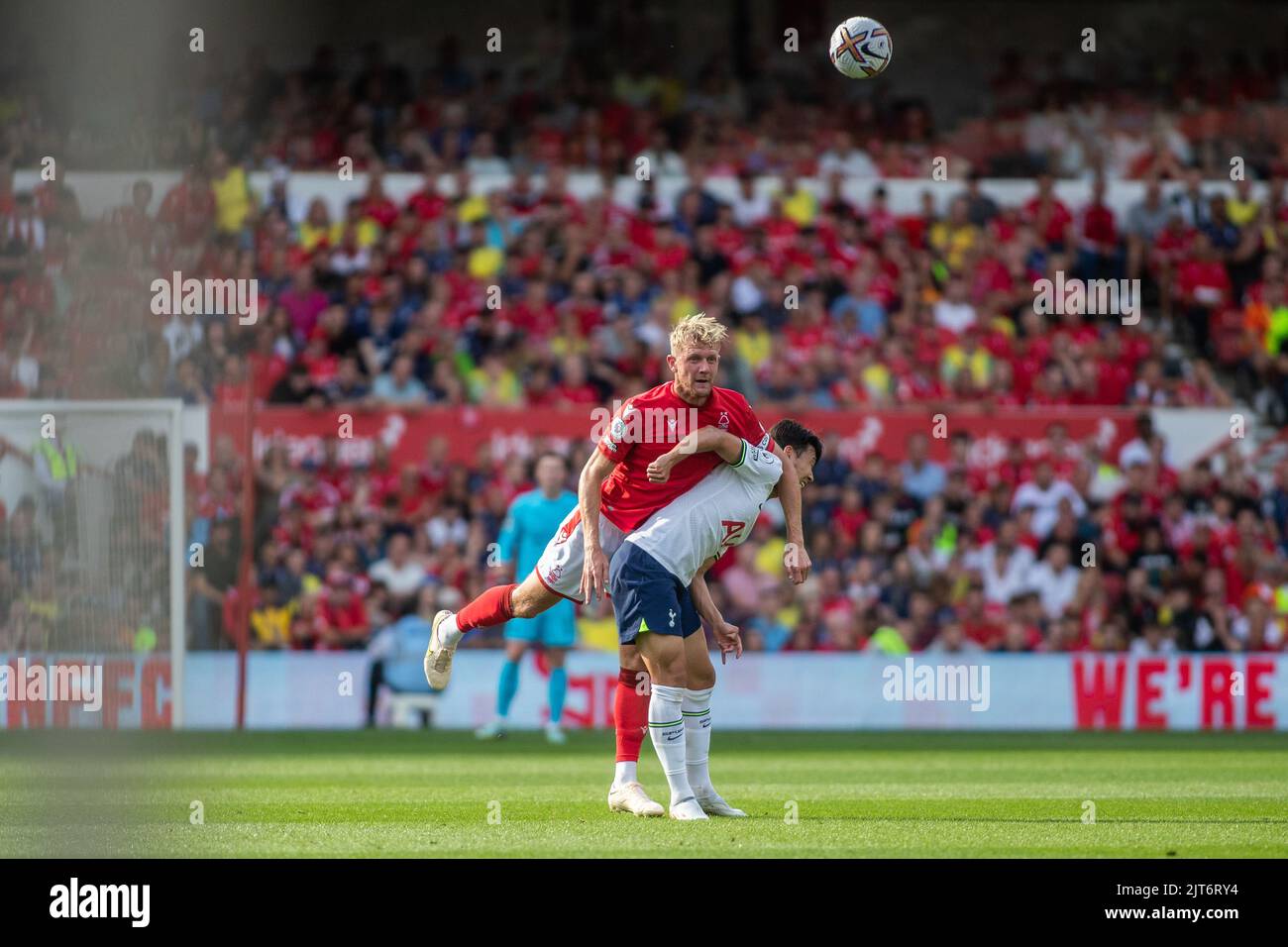 Joe Worrall #4 of Nottingham Forest beats Son Heung-Min #7 of Tottenham ...