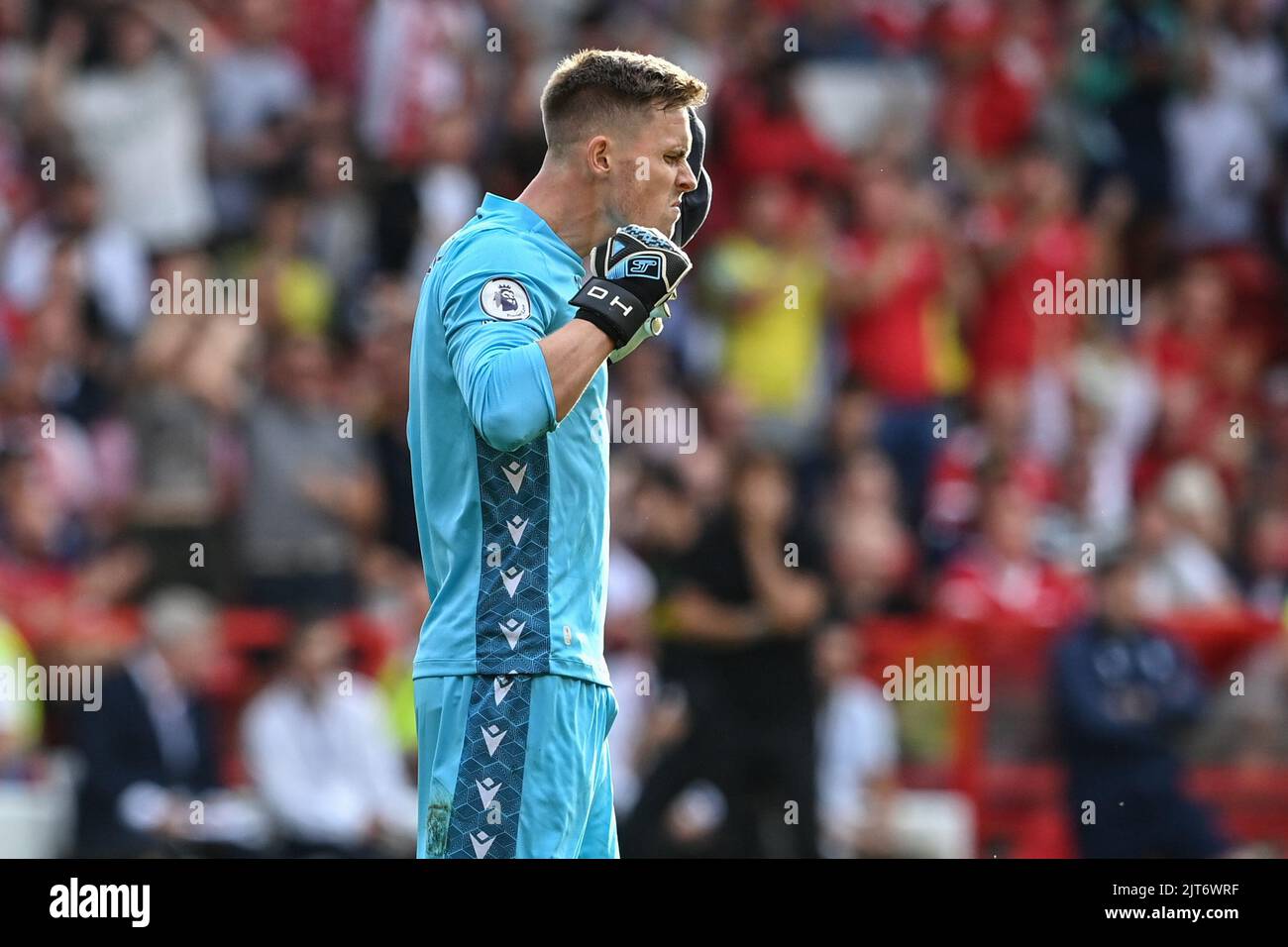 Dean Henderson #1 of Nottingham Forest reacts after saving Harry Kane ...