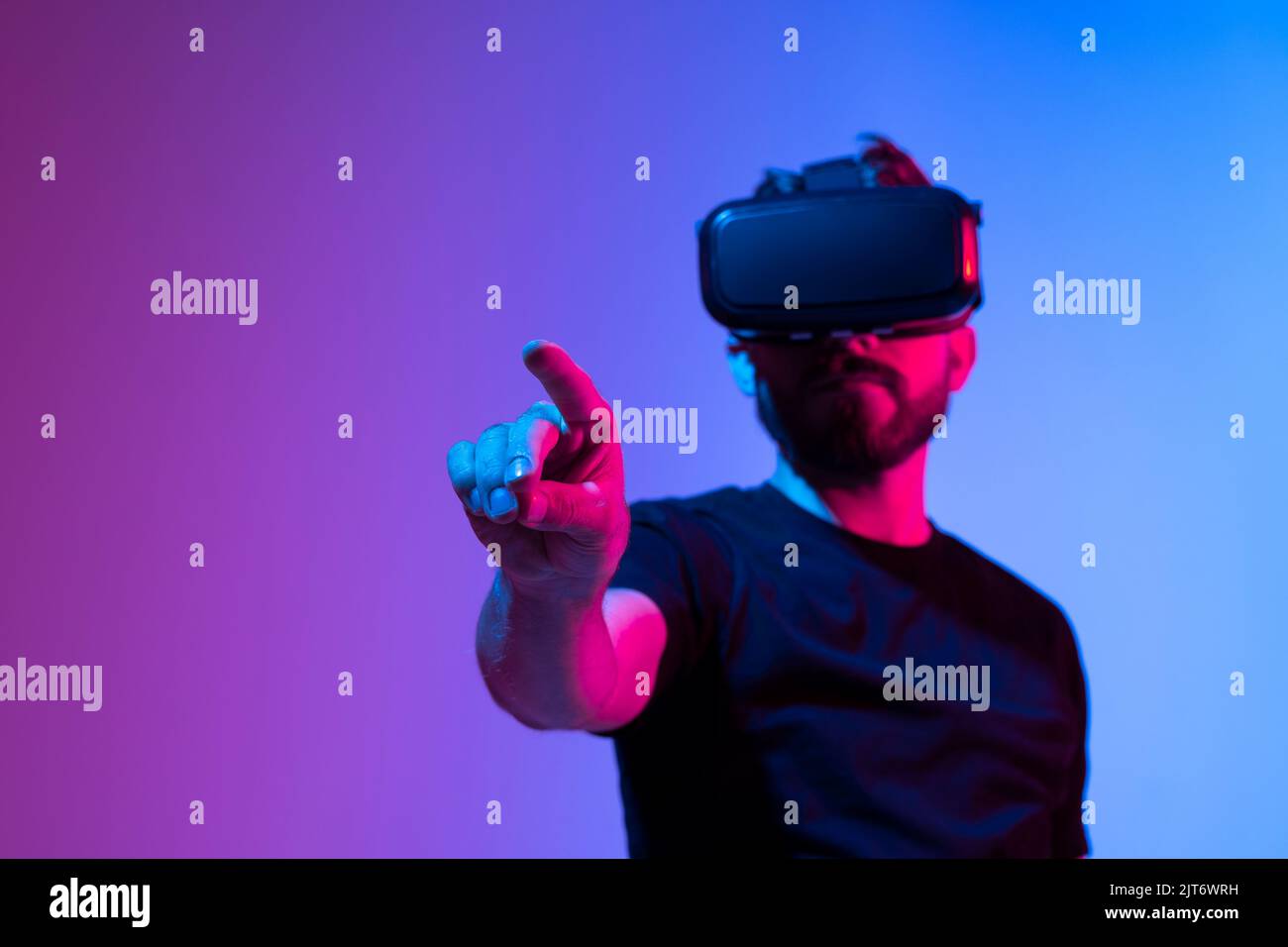 Bearded man in a black t-shirt working on a new design project Stock ...