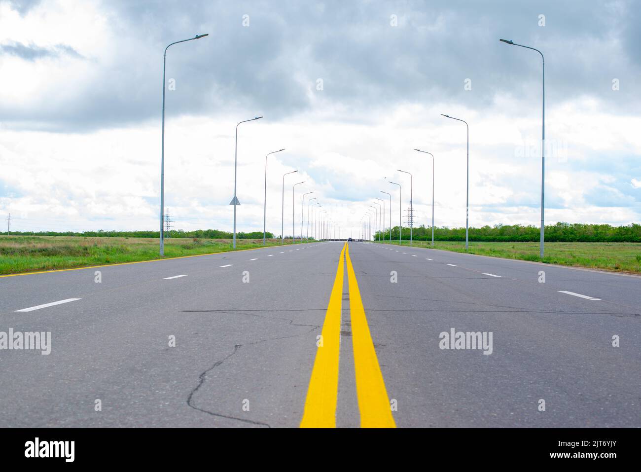 road perspective of paved and sky before rain Stock Photo - Alamy