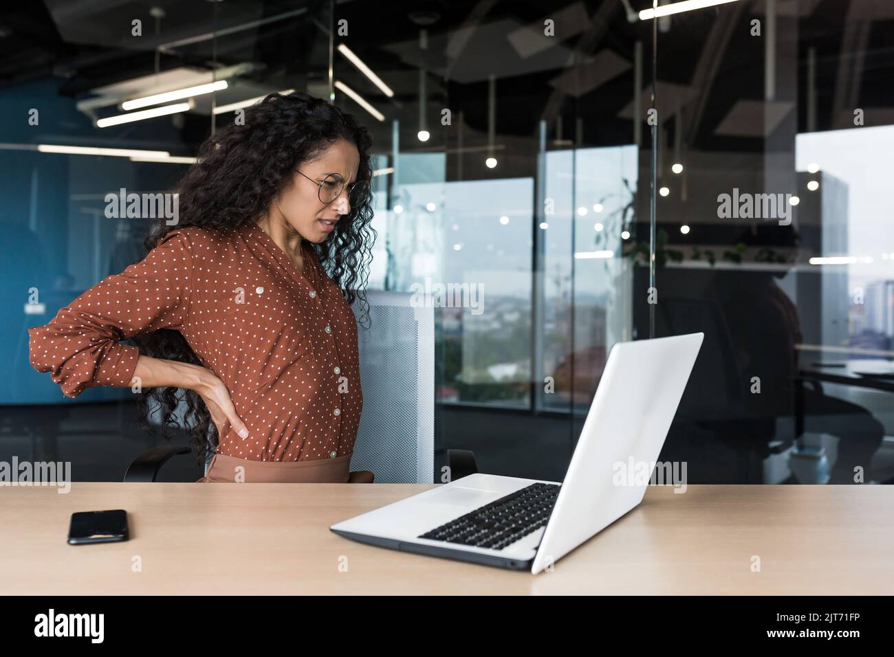 Woman office back pain hi-res stock photography and images - Alamy