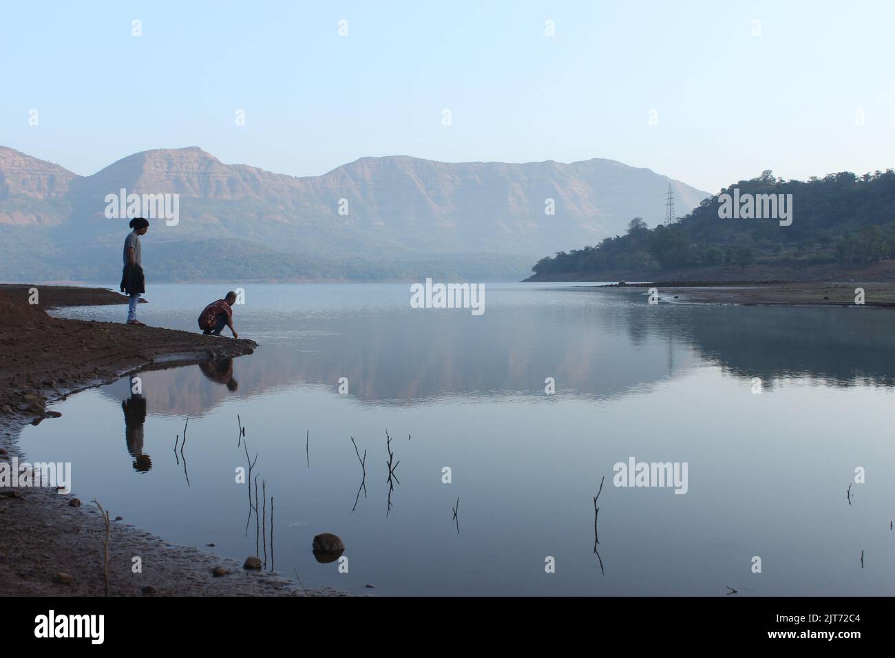 The beautiful scenery of lake and mountain reflection, Pune ...