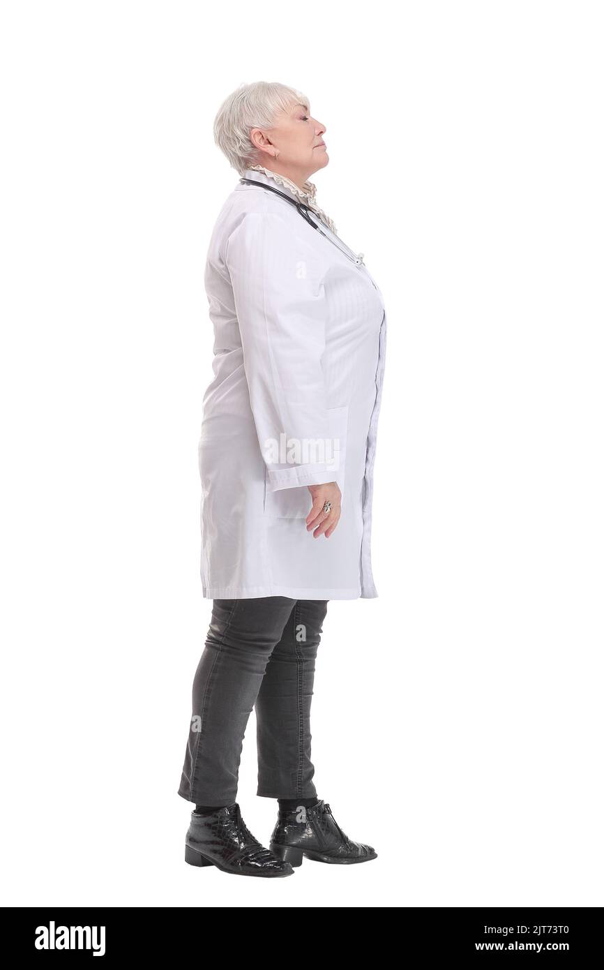 Side view of smiling medical doctor woman with stethoscope and arms ...