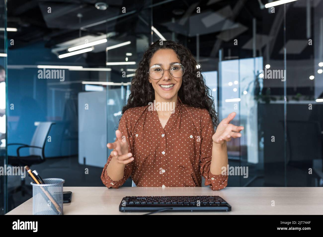Webcam view hispanic curly woman hi-res stock photography and images ...
