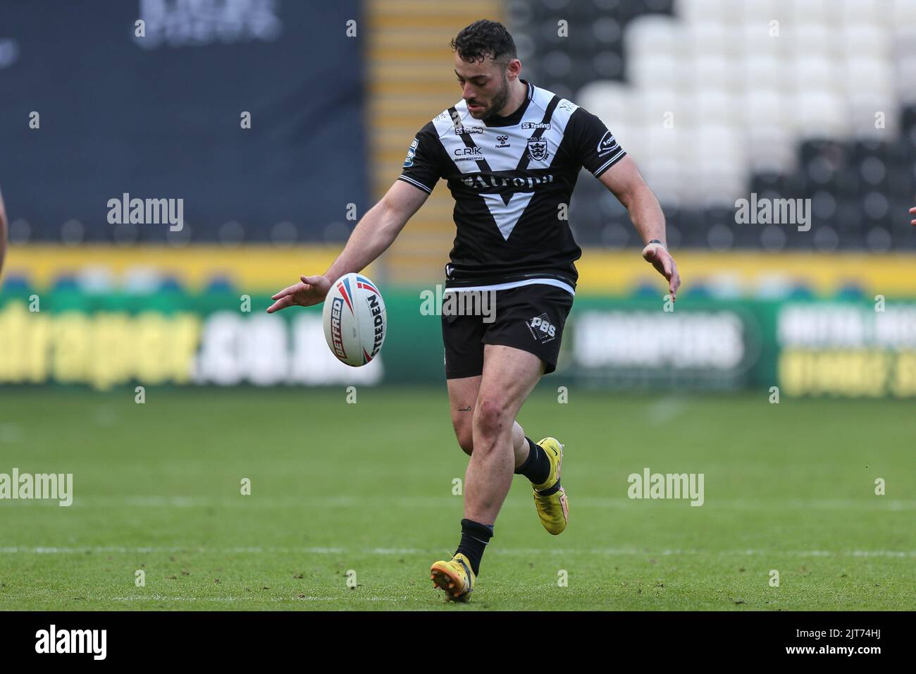 Jake Connor #1 of Hull FC puts a kick up the pitch Stock Photo - Alamy