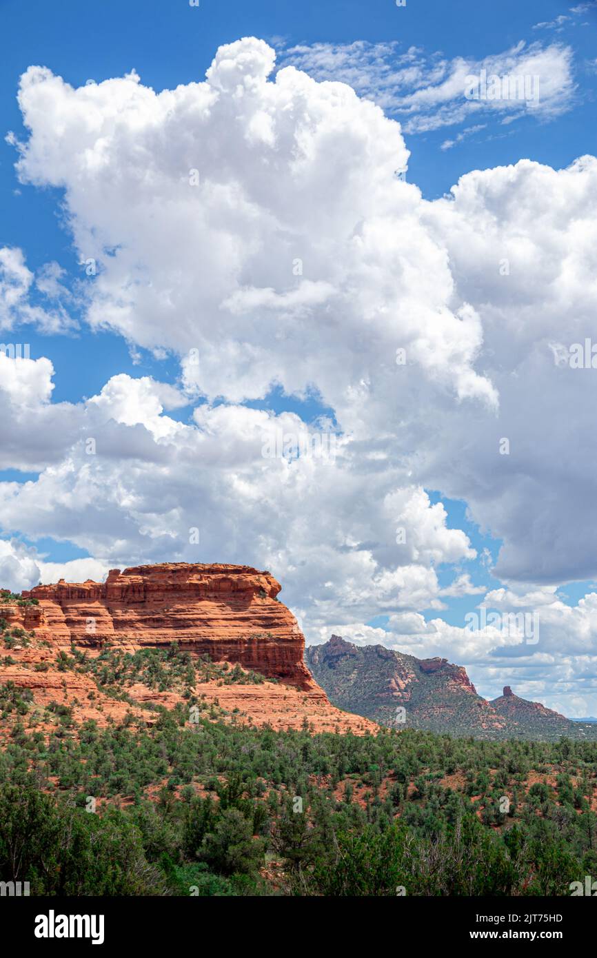 Expansive Sedona landscape with dramatic red rock cliffs under vibrant ...