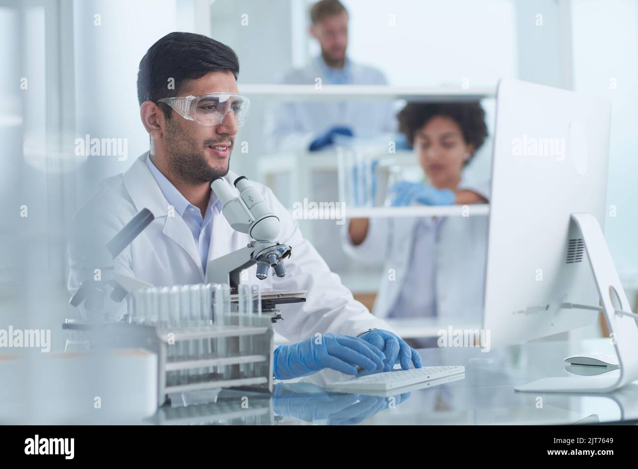 In a Modern Laboratory Research Scientist Conducts Experiments Stock ...