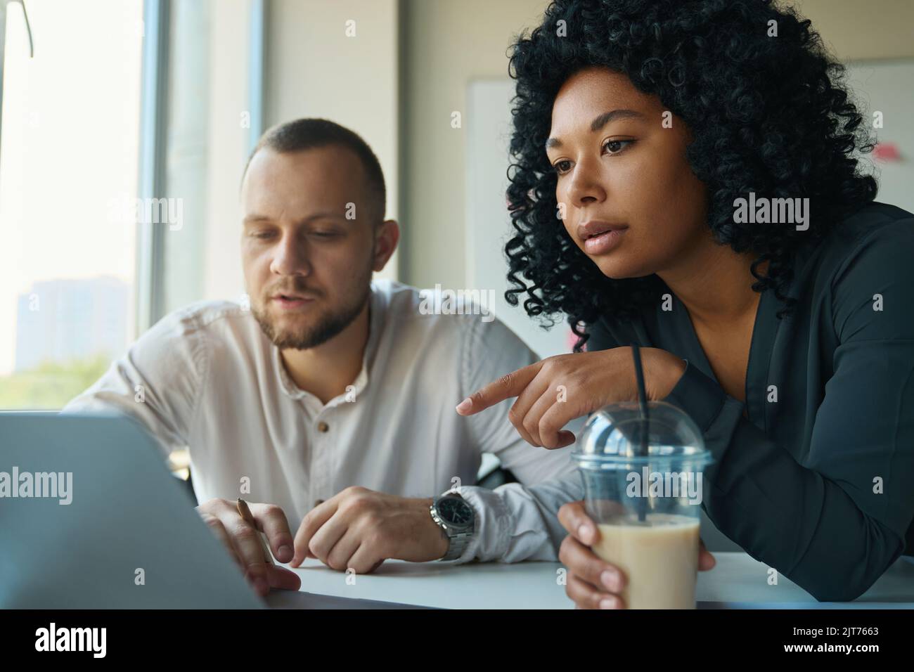 Busy office staff preparing a project presentation Stock Photo - Alamy