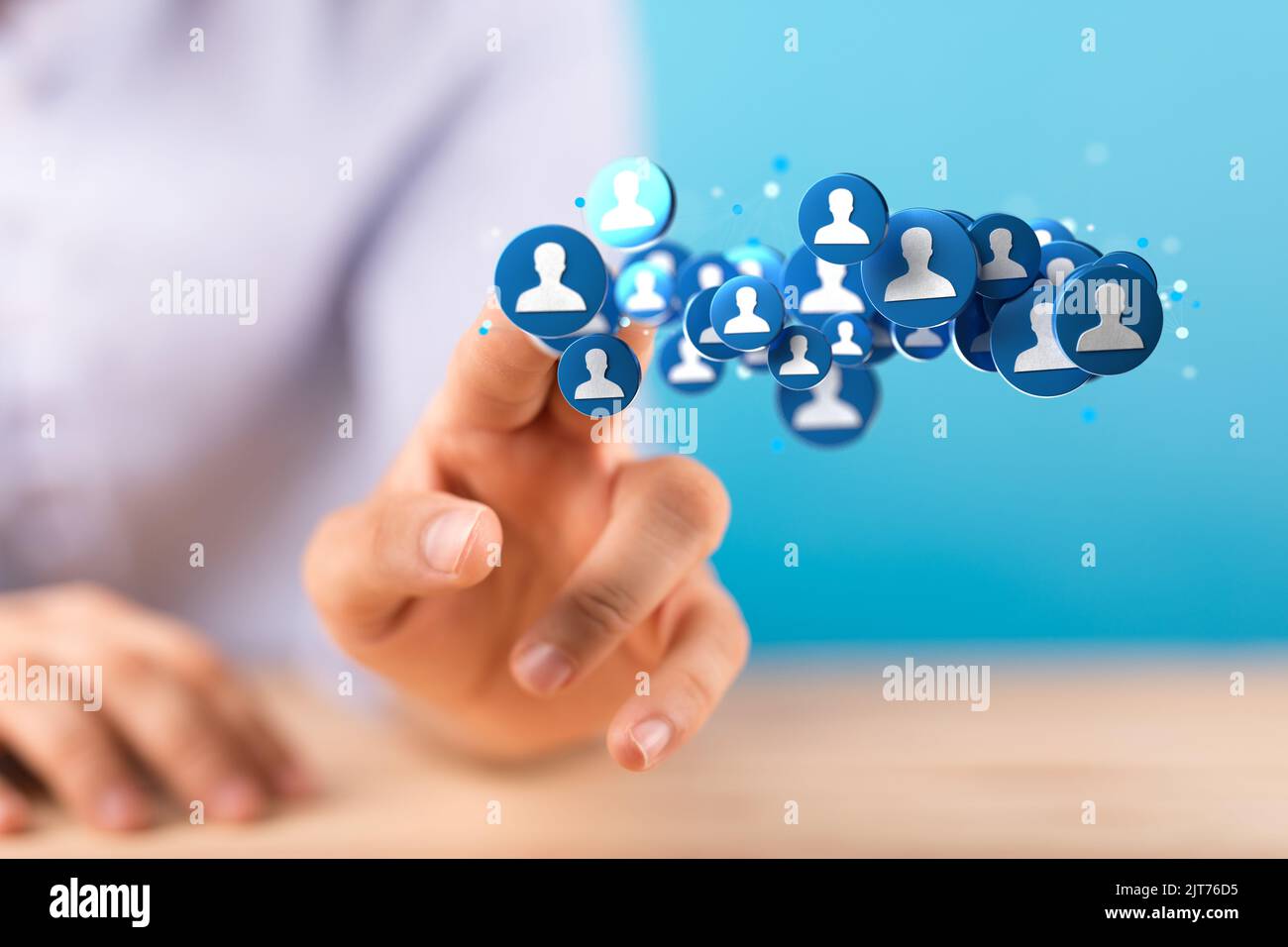 A female toucing 3D rendered people icons Stock Photo - Alamy