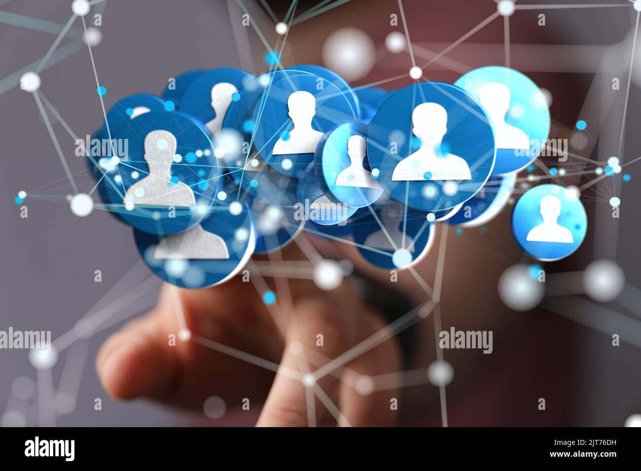 A person touching 3D rendered people icons Stock Photo - Alamy
