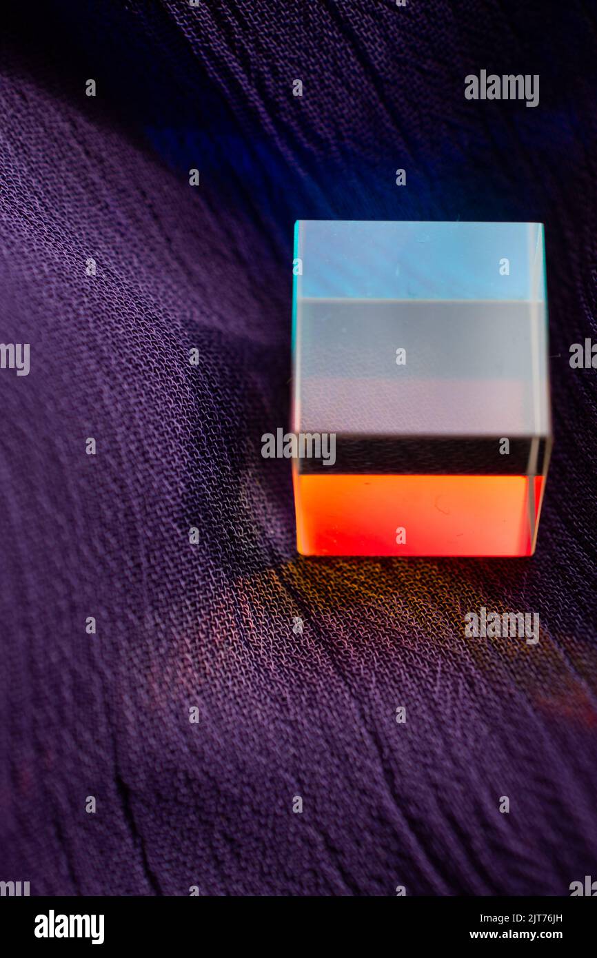Luminous prism cubes refract light in different colors Stock Photo - Alamy