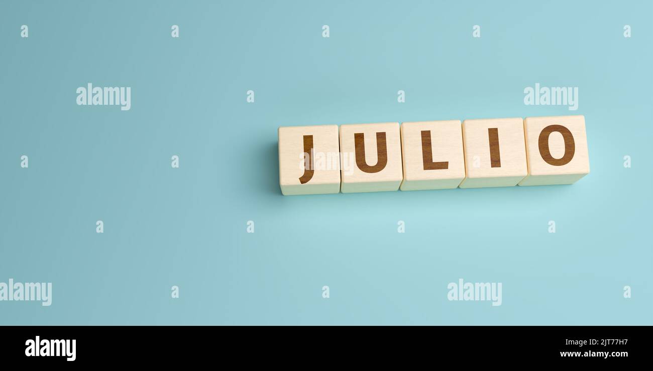 The Spanish word Julio (July) built from letters on wooden cubes. High ...