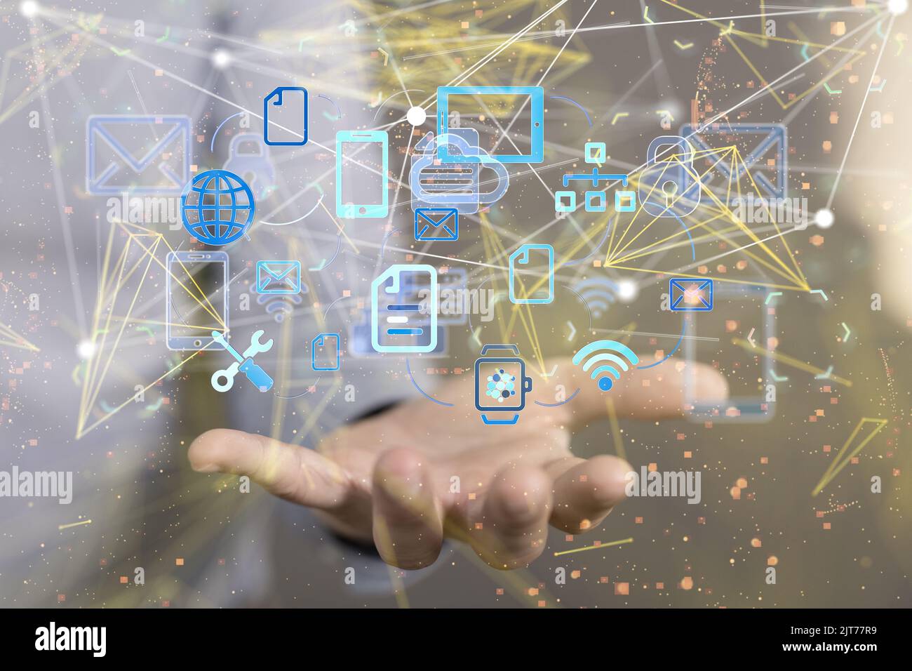 A man holding a floating render of media icons Stock Photo - Alamy