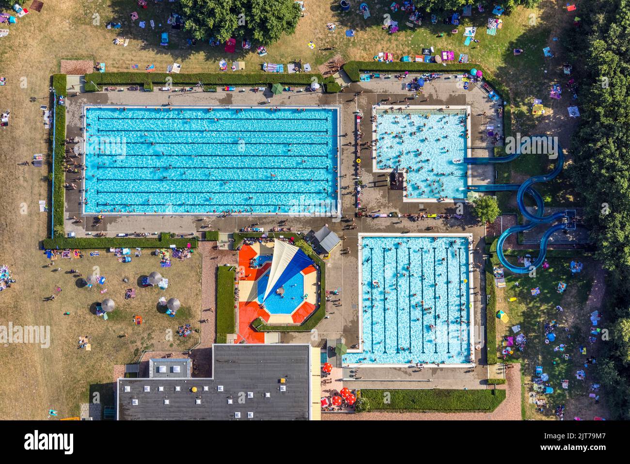Aerial view of swimming fun in outdoor pool berge hi-res stock ...