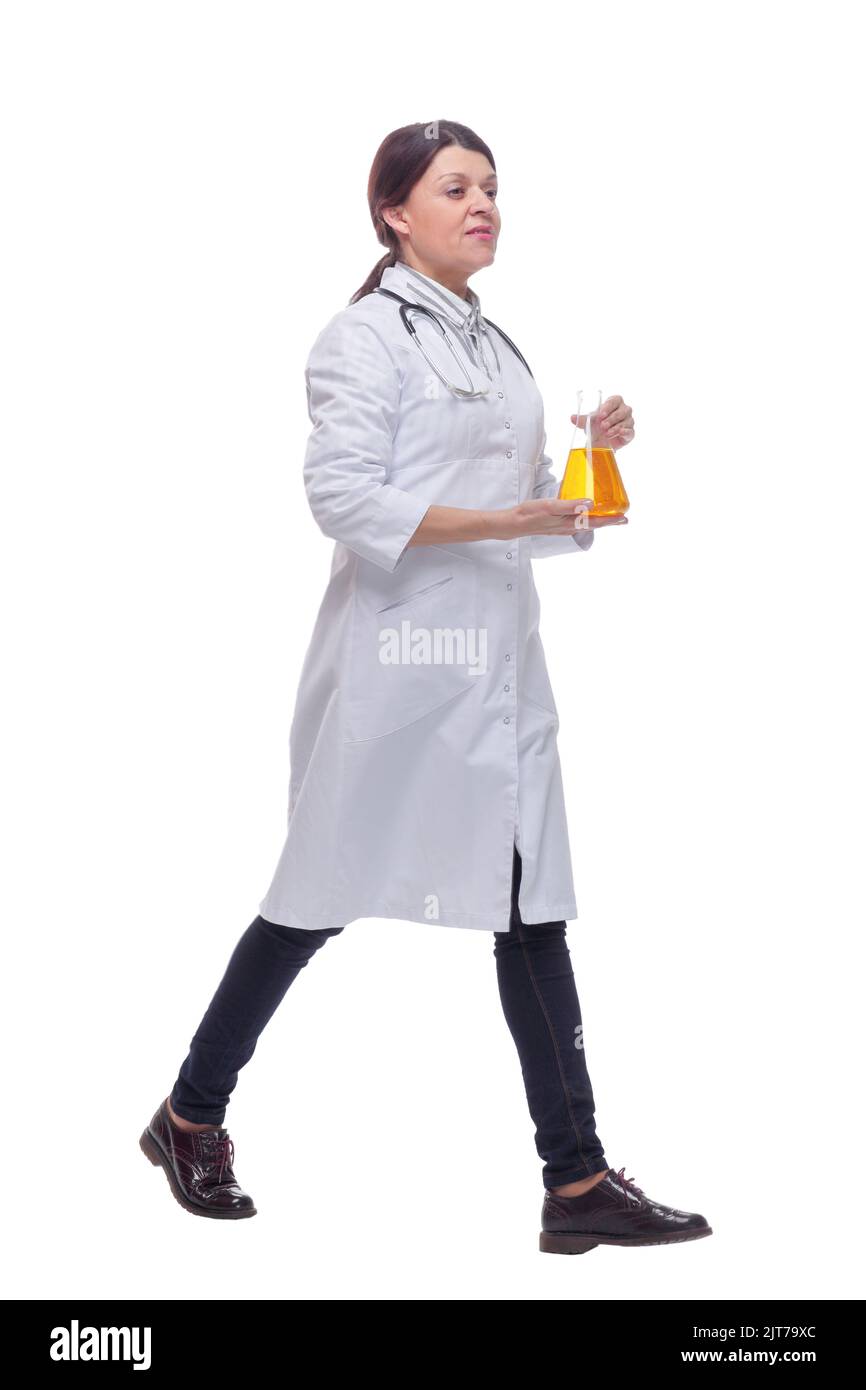 Front view of walking female scientist with beaker Stock Photo - Alamy