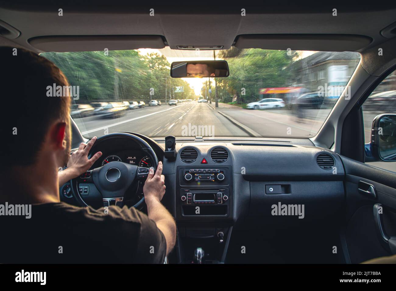 Hands on the wheel when driving at high speed from inside the car Stock ...