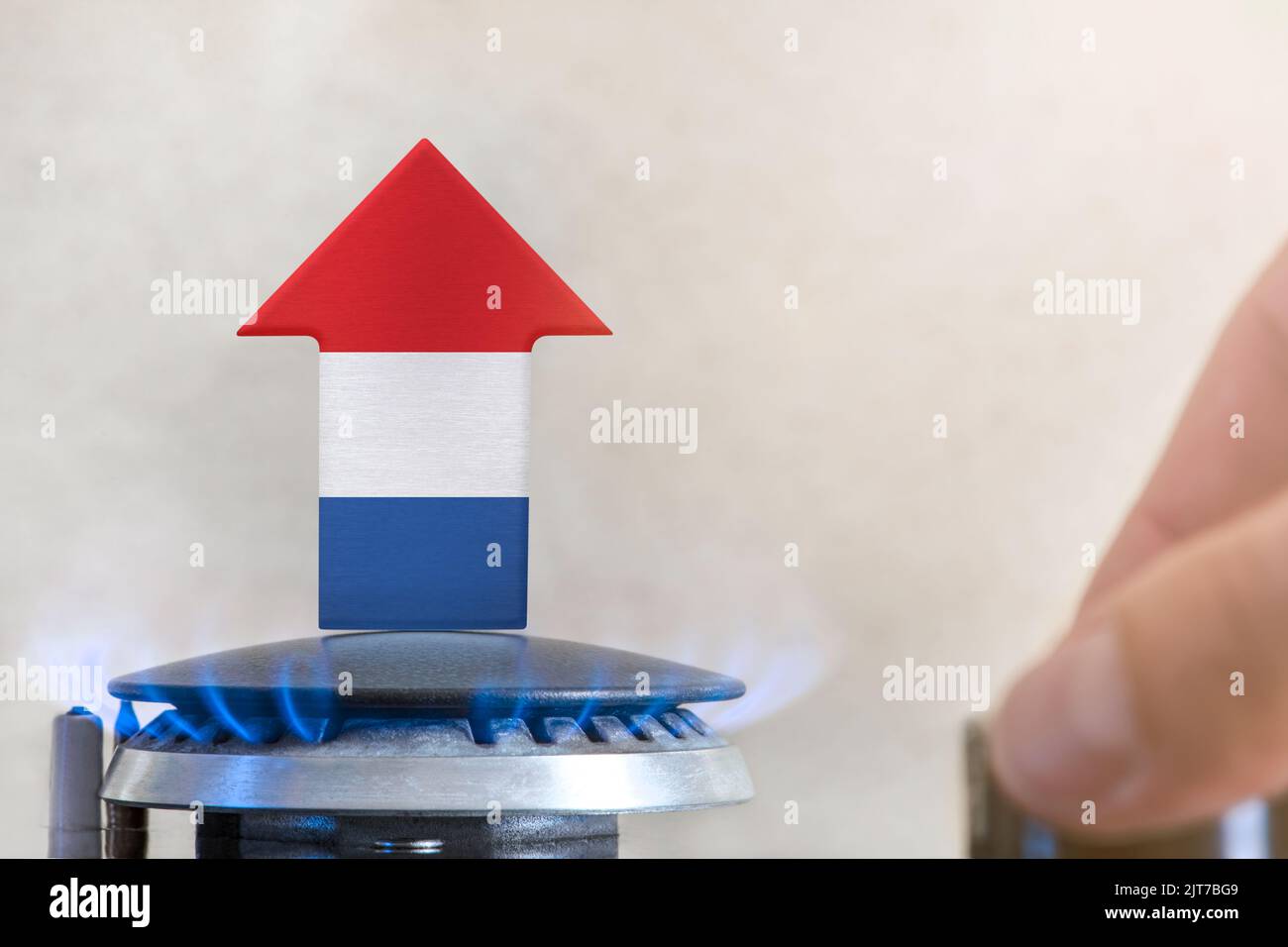 Gas price. Rise in gas prices in Netherlands. A burner with a flame and ...