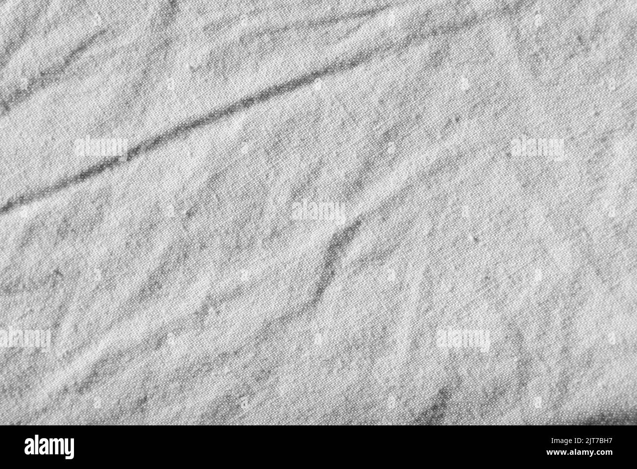 Close up, detail shot, texture and background of woven fabric that is a ...