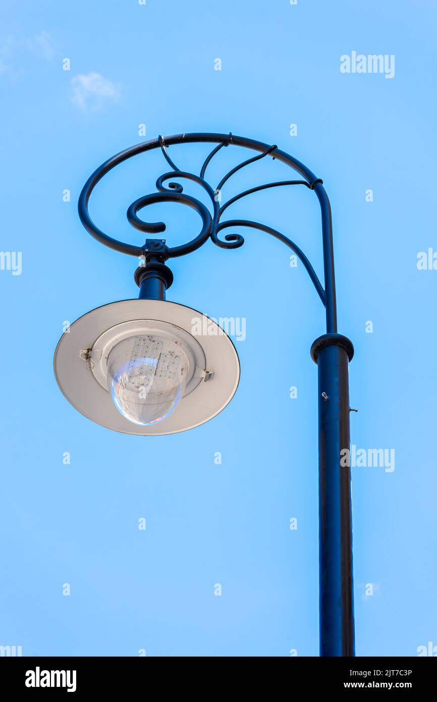 Modern lamp post against a blue sky hi-res stock photography and images ...