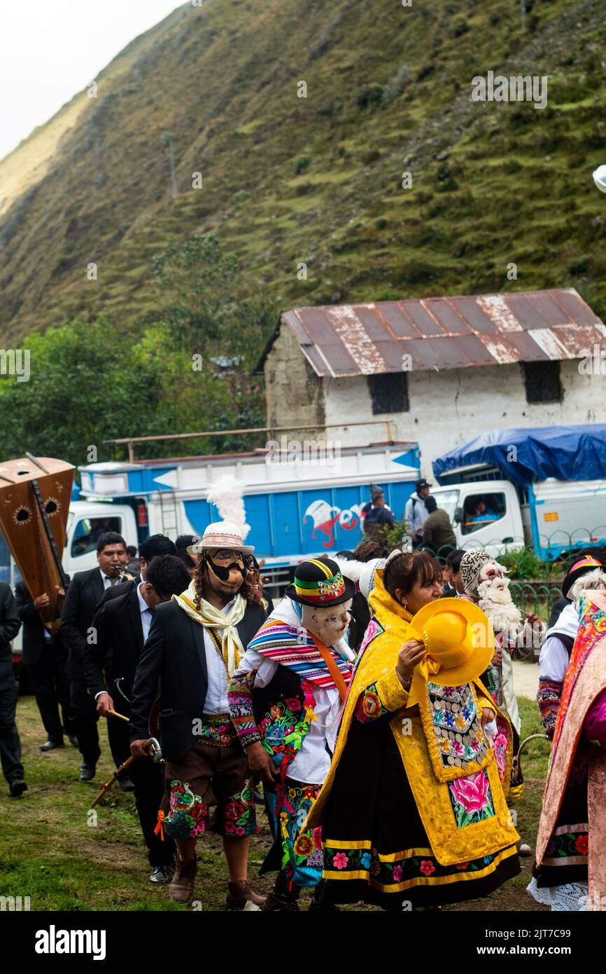 The group of people in Peruvian typical costumes from the "La Tunantada ...
