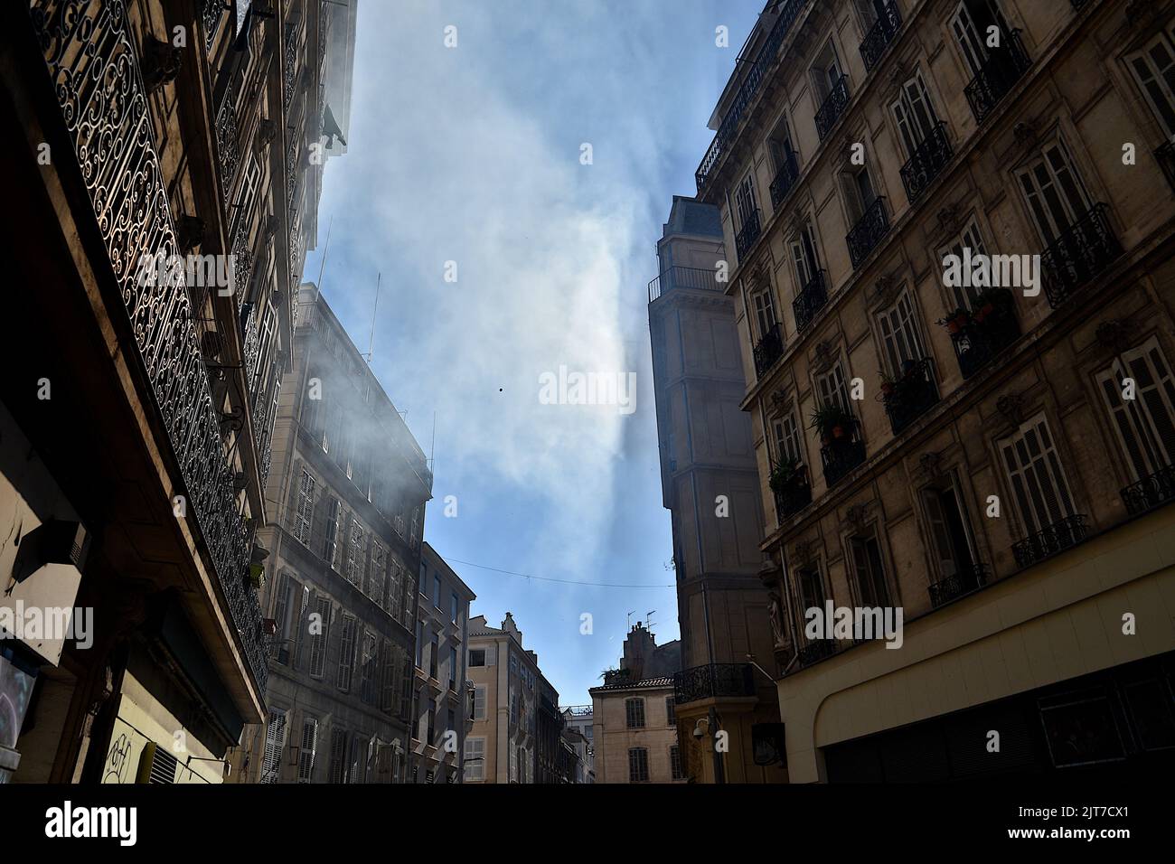 Marseille, France. 27th Aug, 2022. Smoke is seen between buildings ...