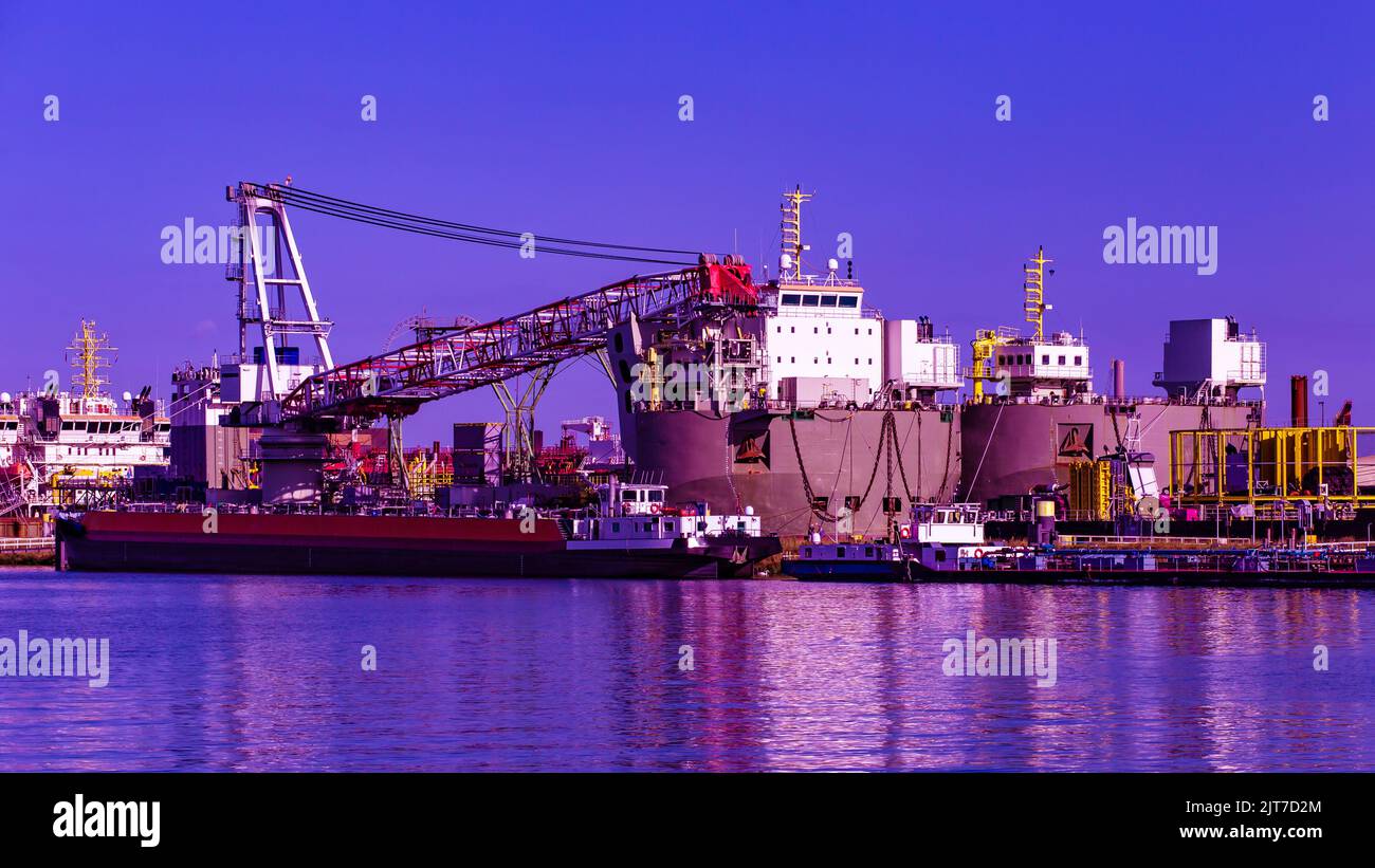 Tankers in the harbour of Rotterdam at night Stock Photo - Alamy