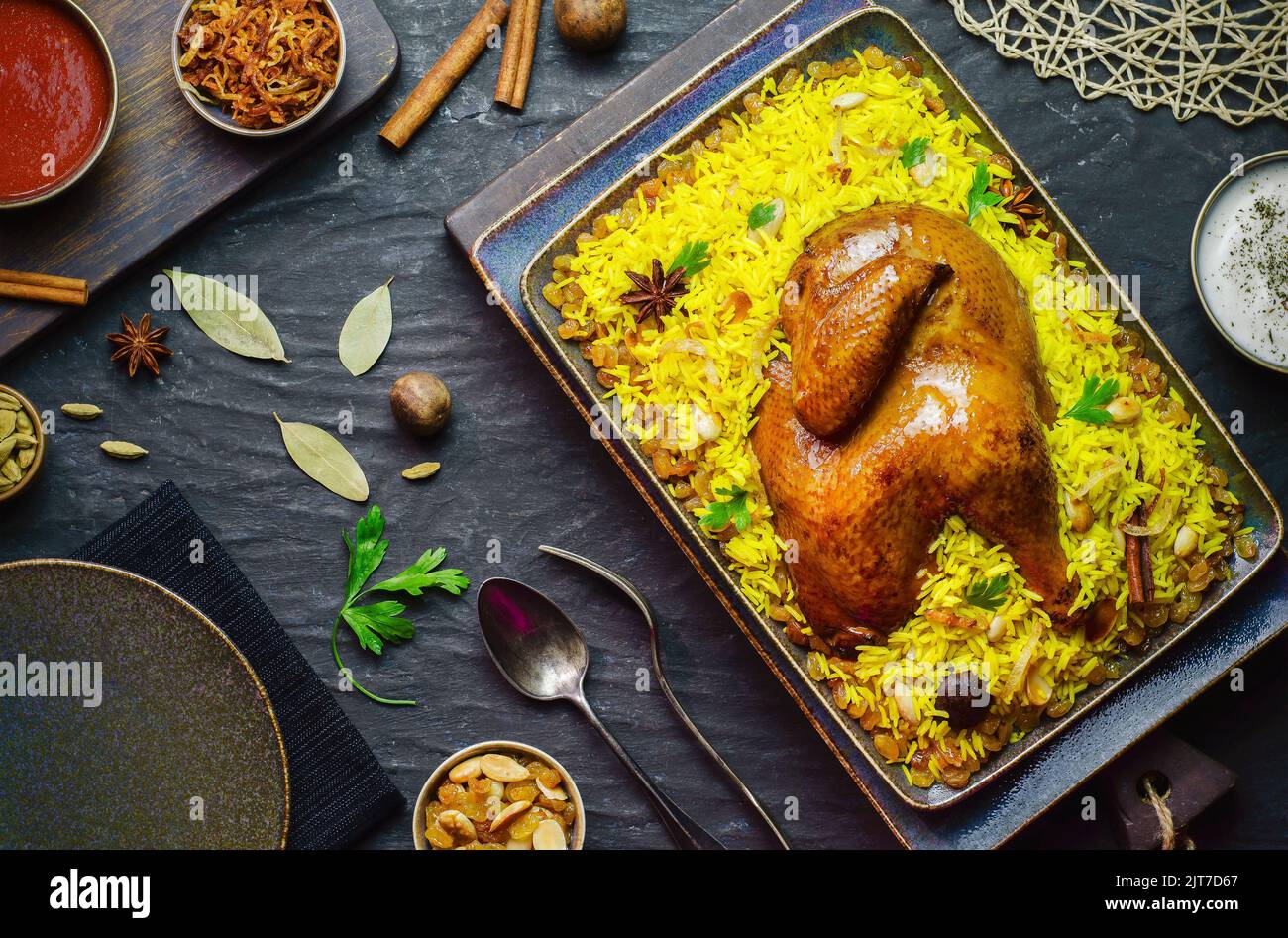 Arabic cuisine; Chicken "Kabsa" or Chicken Beryani rice. Served with ...