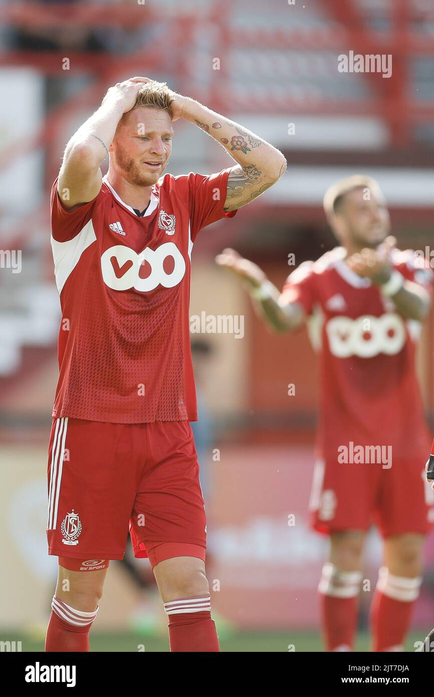 Kortrijk, Belgium. 28th Aug, 2022. Standard's Renaud Emond reacts ...