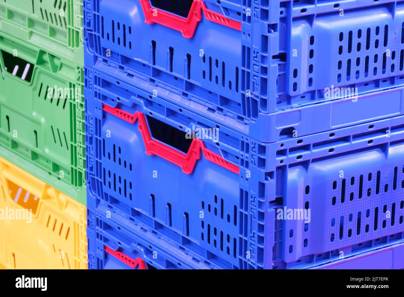 Colorful plastic boxes, logistic concept Stock Photo - Alamy