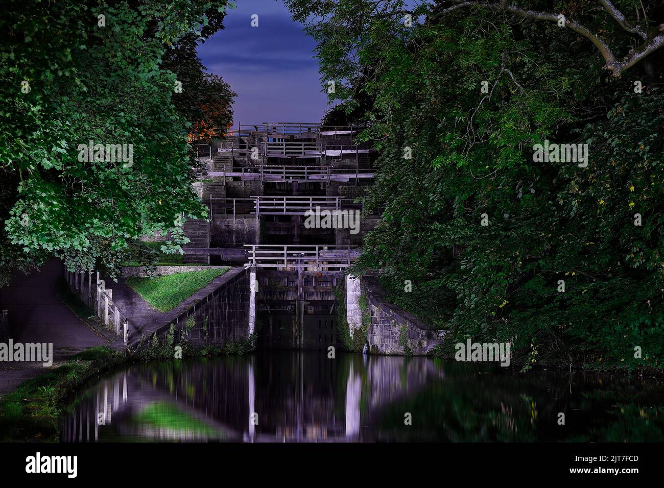 Five Rise Locks illuminated by torch light at night in Bingley,West ...