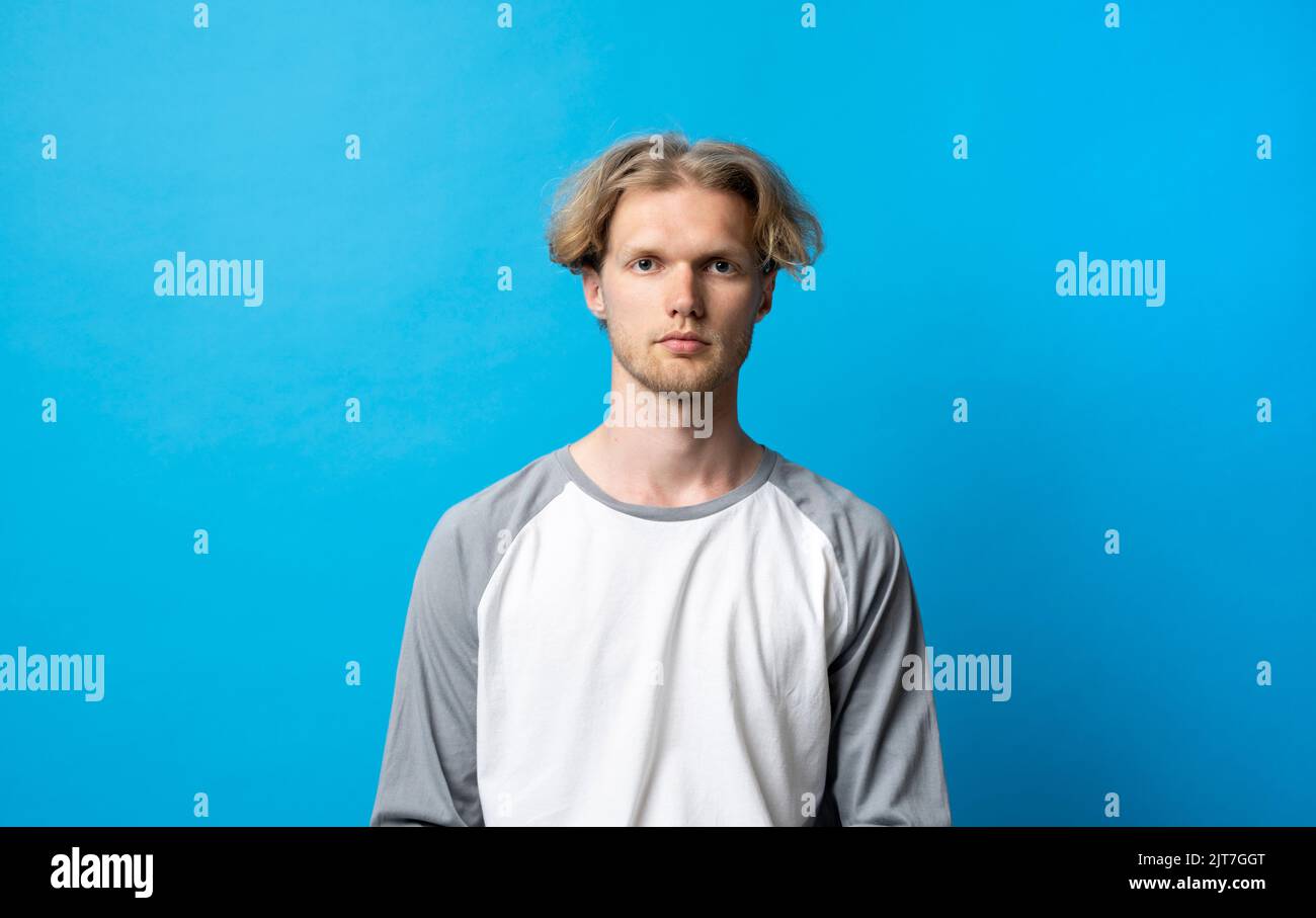 Portrait of calm serious mature young man without emotions. Beautiful ...