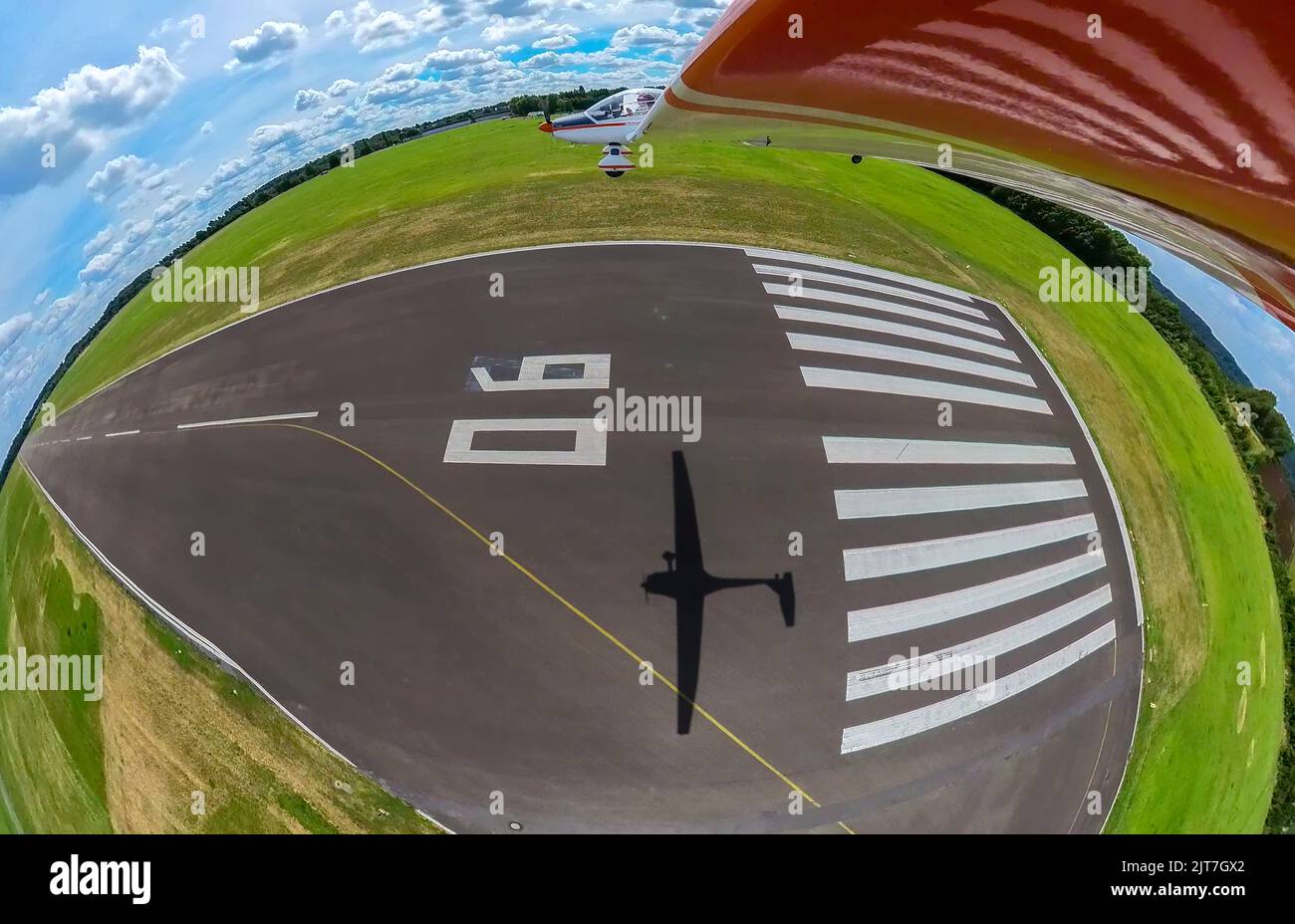 Airport essen mulheim runway and takeoff runway with airplane hi-res ...