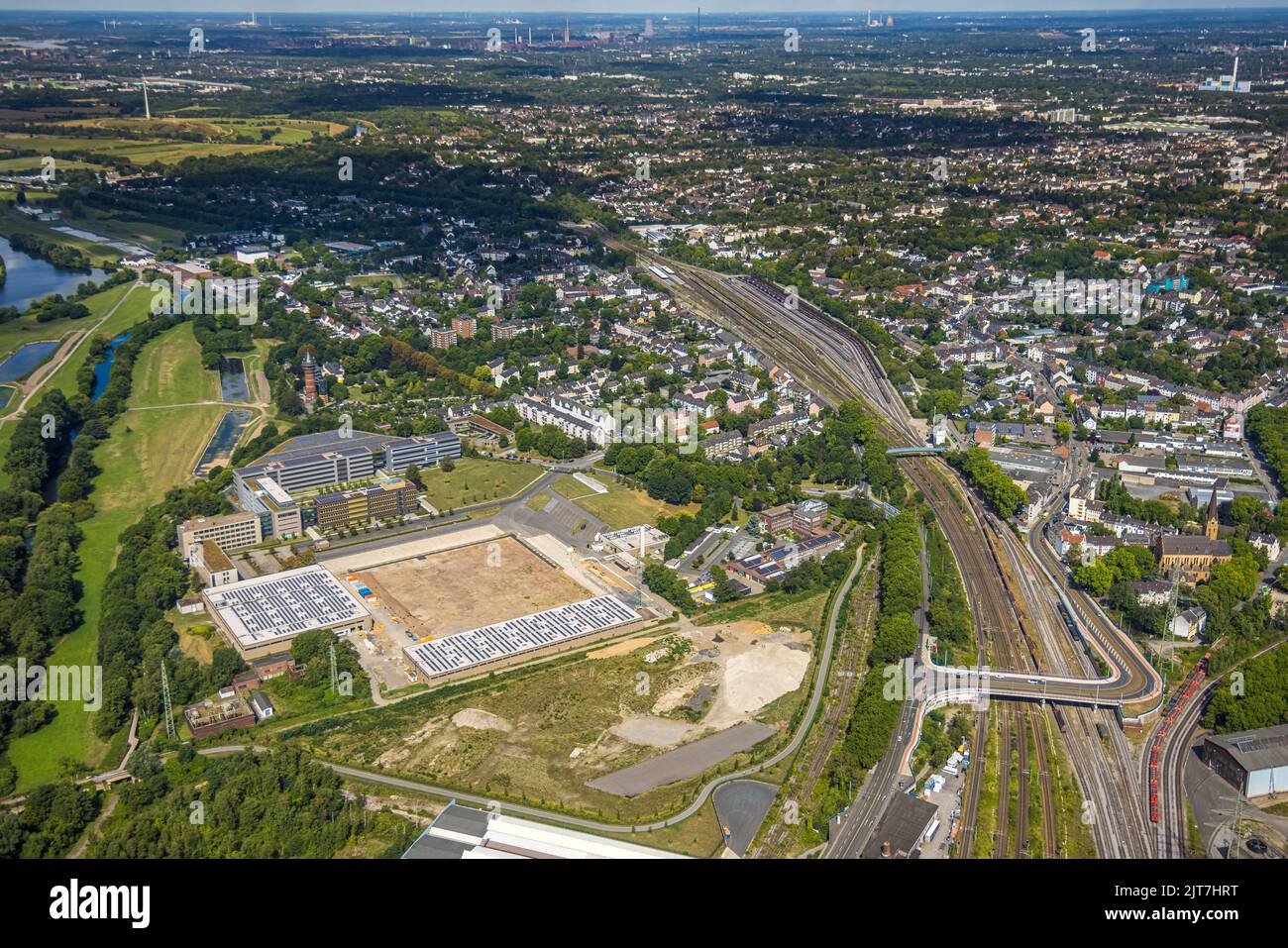 Aerial view, Aldi Süd company headquarters, solar roof, railroad tracks ...
