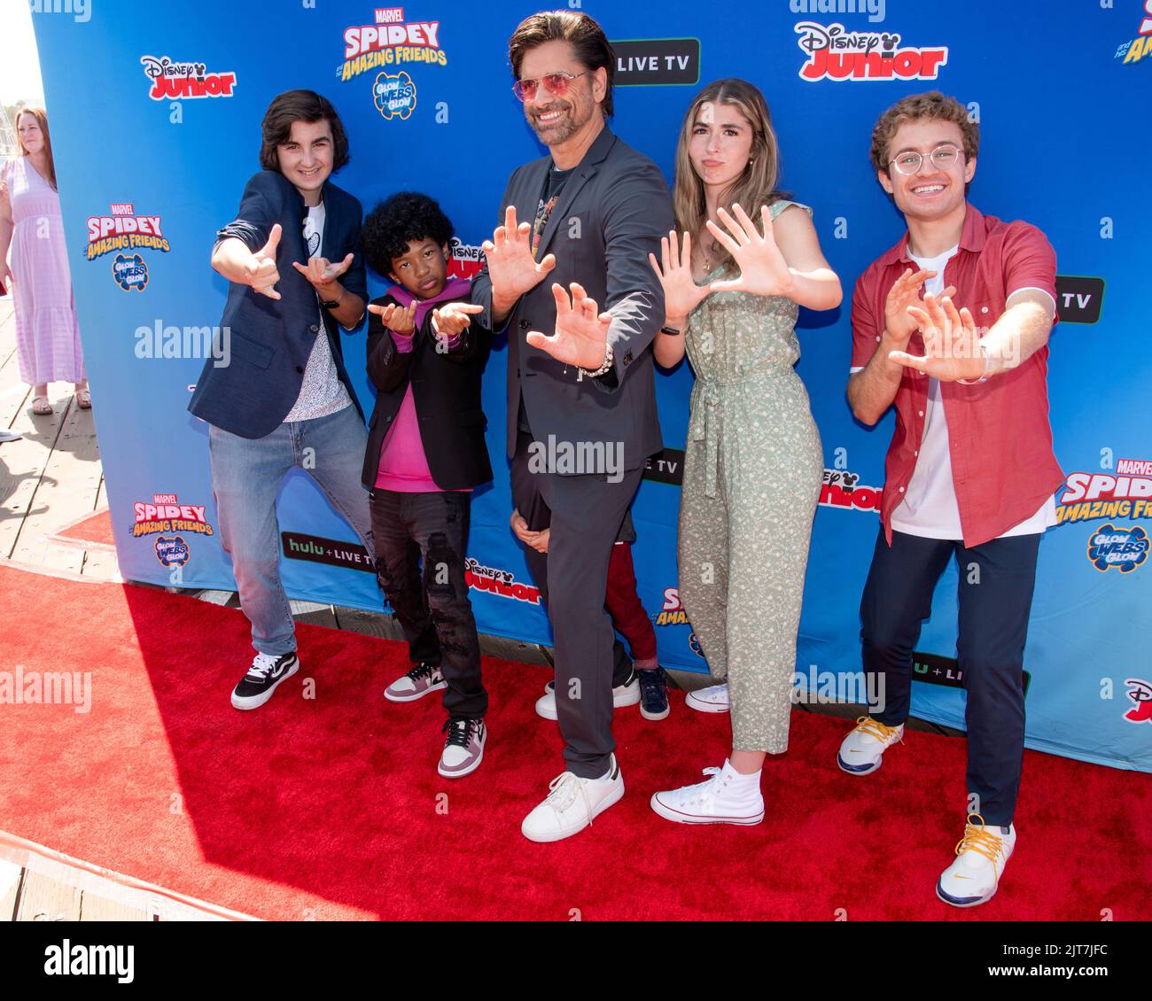 27 August 2022 - Los Angeles, California - (L-R) Benjamin Valic, Jakari Fraser, John Stamos ...